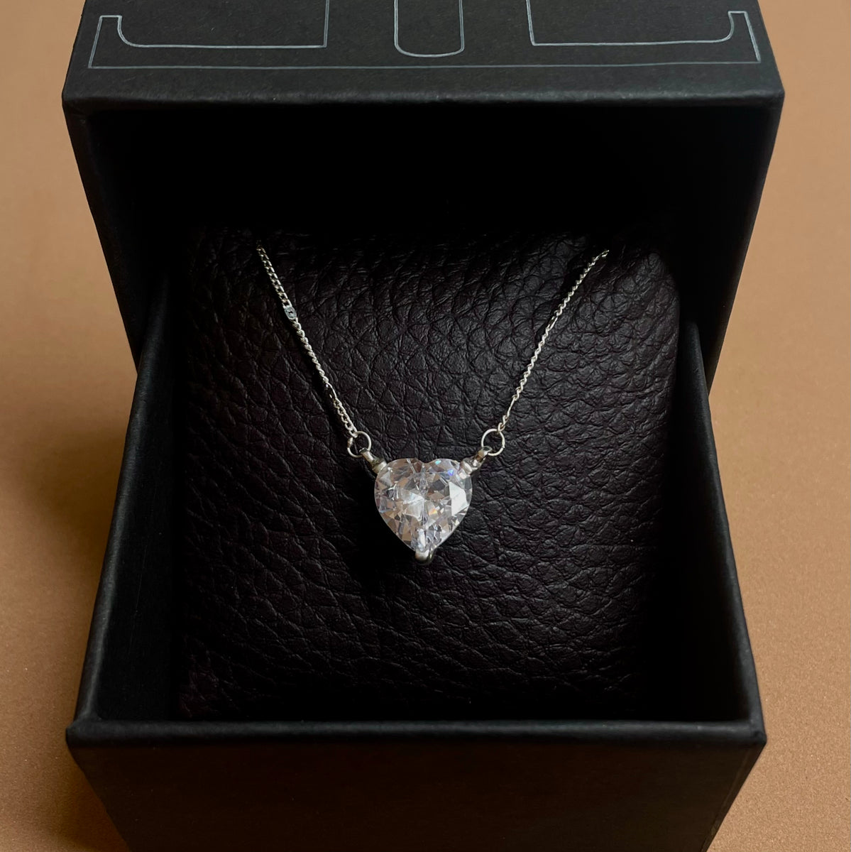 Ice Heart - Corazón cruzado en base de plata– Elegance la